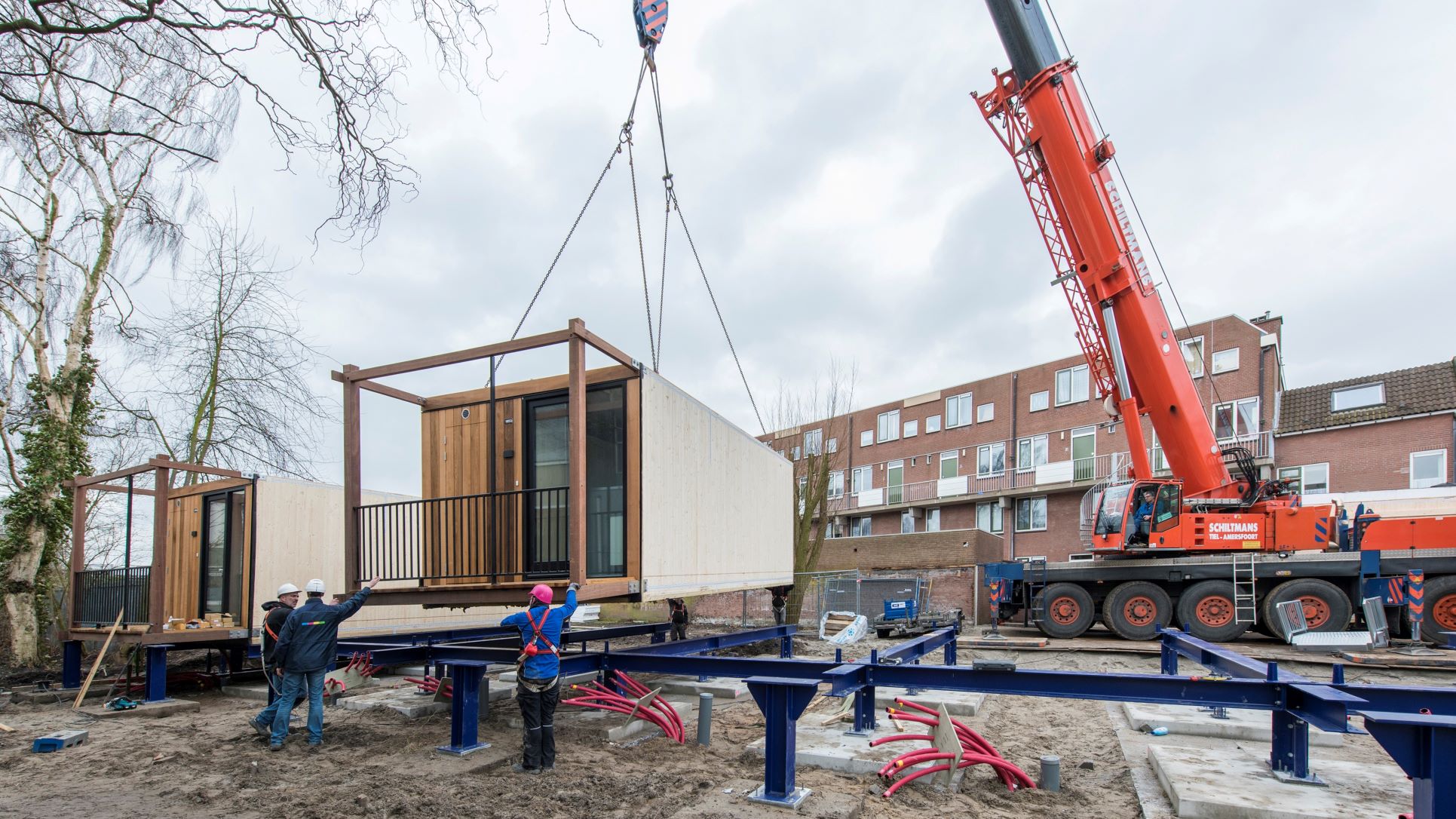 Opinie | Het is chaos in de bouwsector, en dat is een goed teken